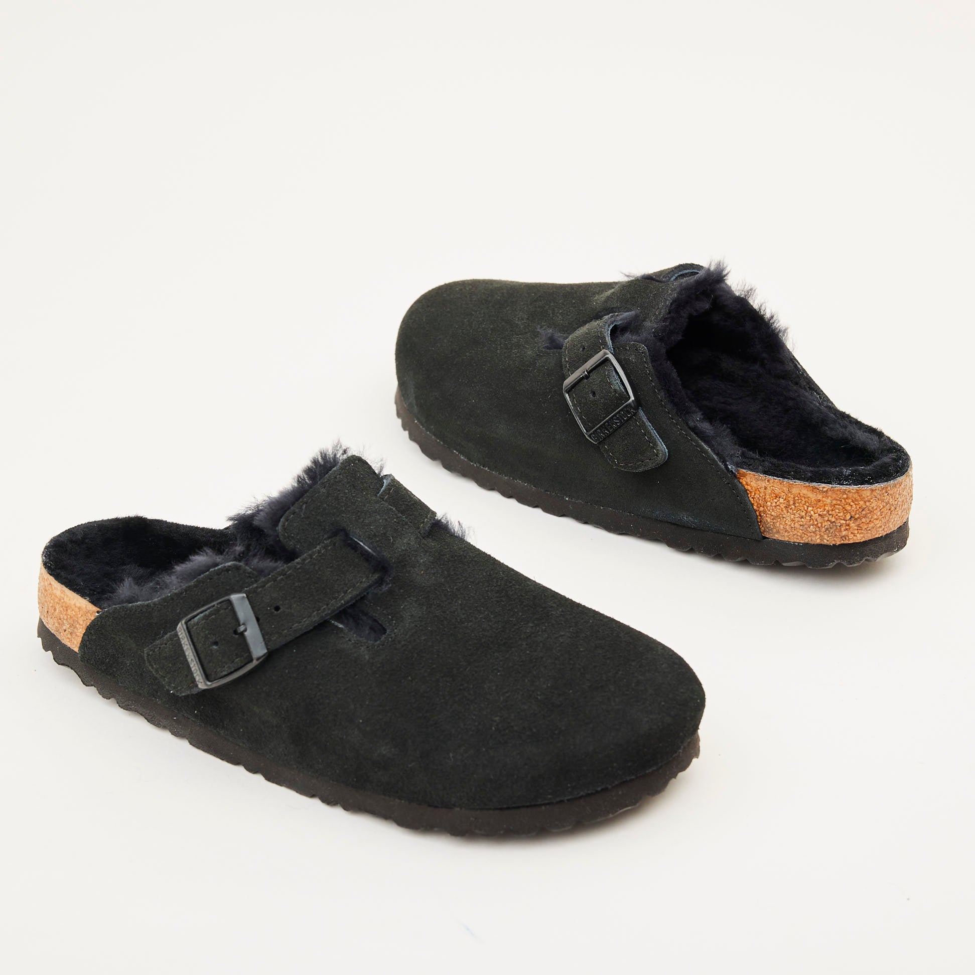 Birkenstock Black Suede Shearling Clogs | Shop online @ Nozomi